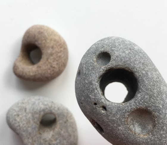 What Is A Hag Stone? Why Did Merlin the Magician Wear Them?