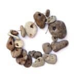 What Is A Hag Stone? Why Did Merlin the Magician Wear Them?